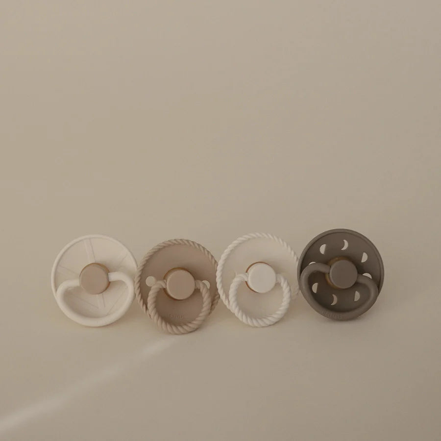 FRIGG 4-Pack Pacifiers – Try 4 Styles in One Beautiful Set